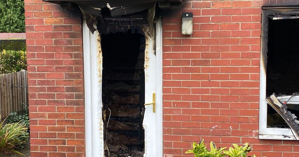 Couple 'trapped' inside as devastating fire rips…