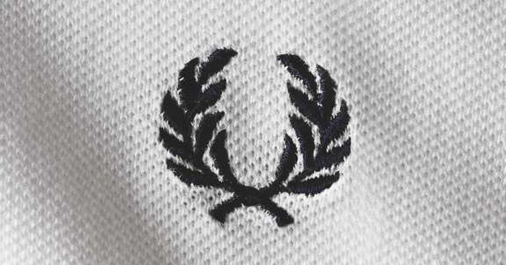 Fred Perry's iconic symbol and the controversial…