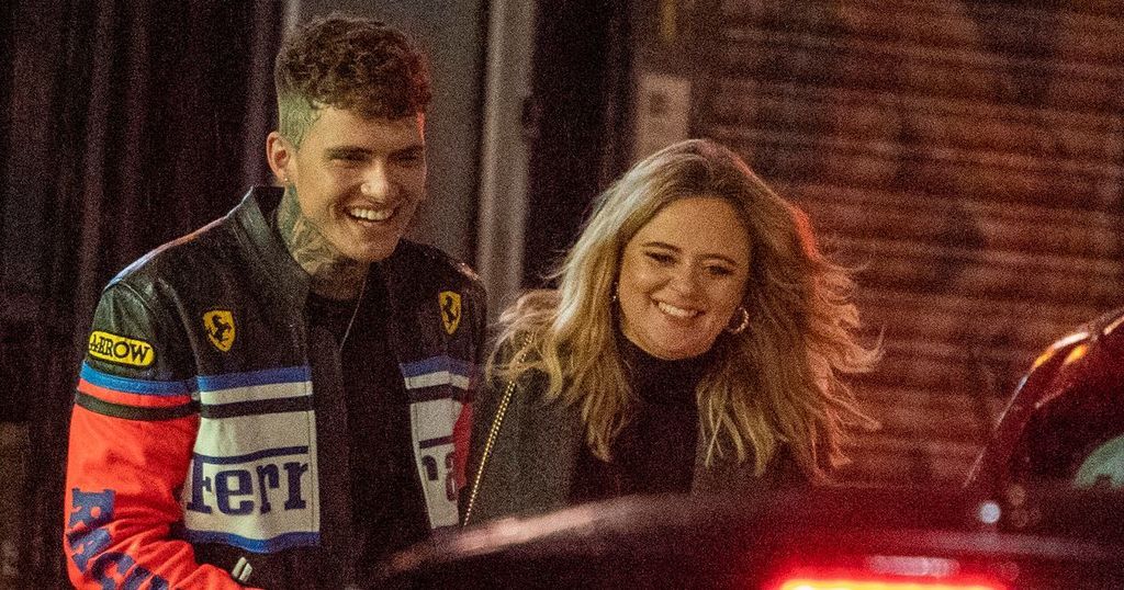 Emily Atack snogs hunky model after unveiling…