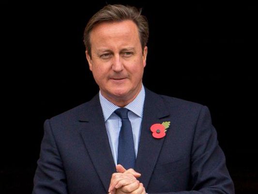 David Cameron 'struggles' to build Lego duck at summit…
