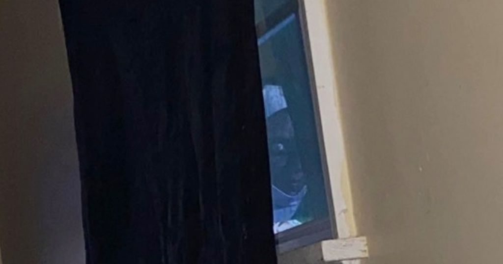 Woman spooked after seeing 'haunting' reflection in…