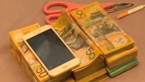 Secret stash: Two behind bars, $80k cash found and a…