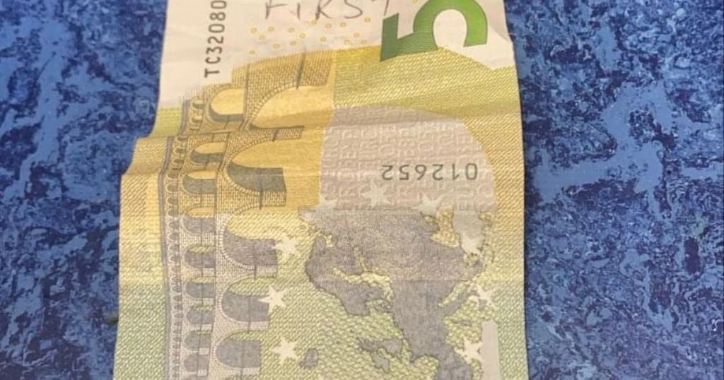 Outrage as 'sick' images of doctored €5 note spread on…