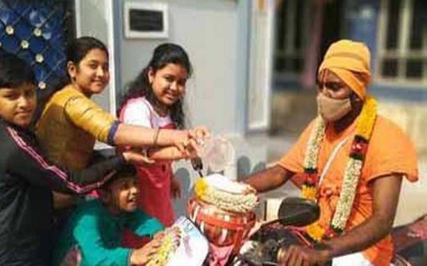 This year, haridasu arrives on a motorbike