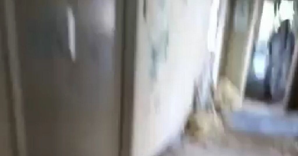 Ghostly figure caught on camera staring at people…