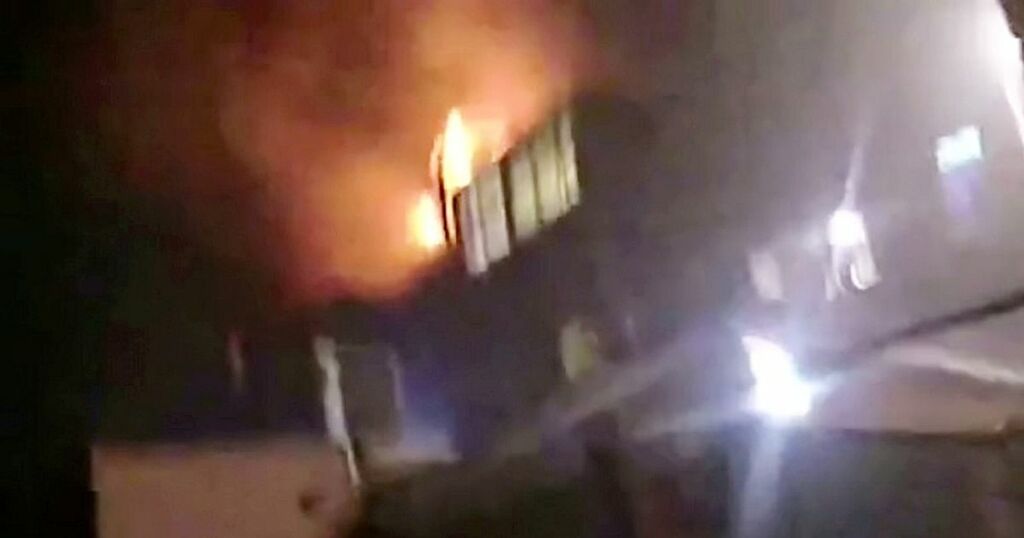 Moment hero PC runs into burning building to save…