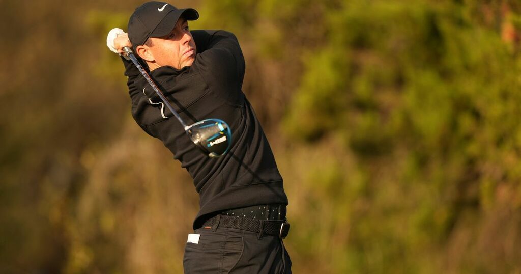 Rory McIlroy drives shot into swimming pool during…