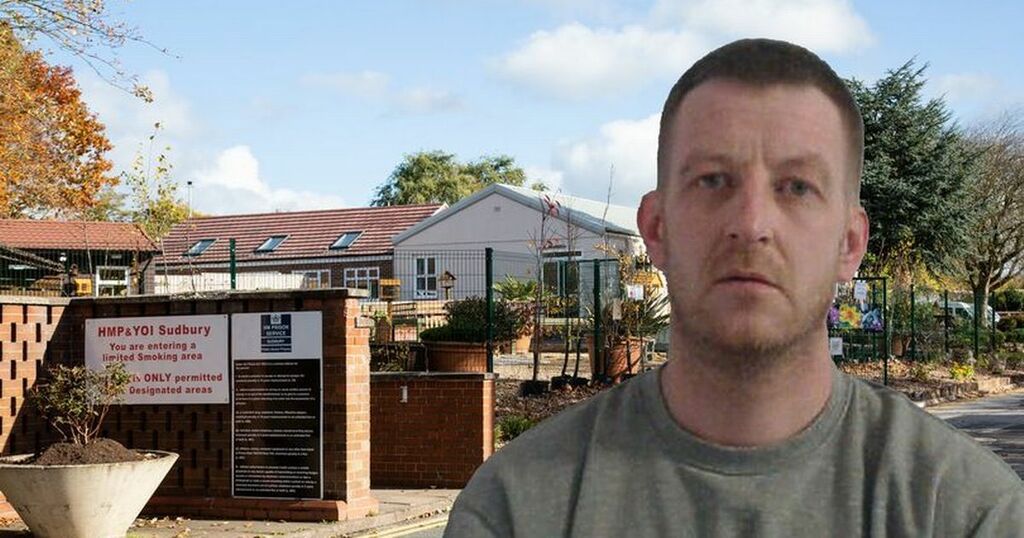 Convict who walked out of prison found hiding topless…