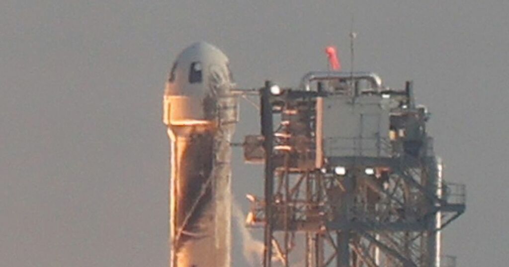 Jeff Bezos' Blue Origin spaceship blasts off in…