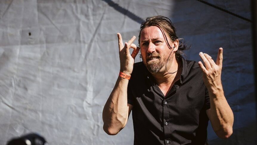 Auslan interpreter Mikey Webb raises awareness of deaf…