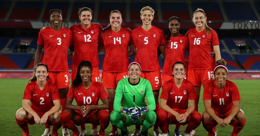 Canadian footballer Quinn makes history as first…