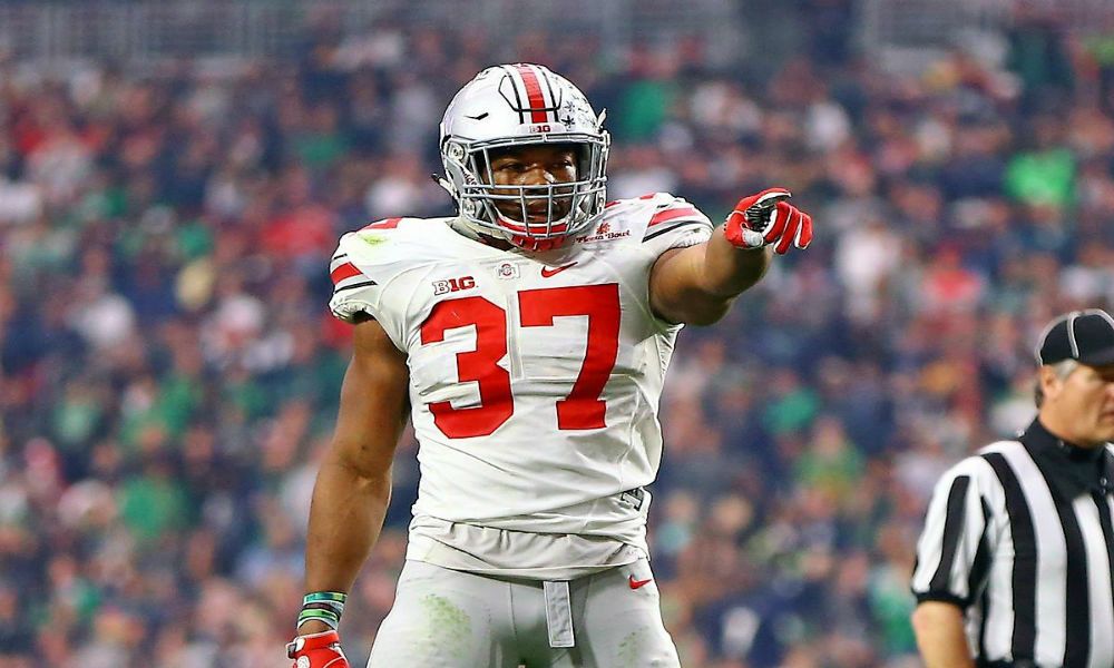 Former Ohio State players Joshua Perry and Evan…