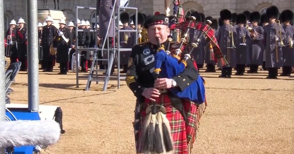 Inside life of Queen's bagpiper who moved into…
