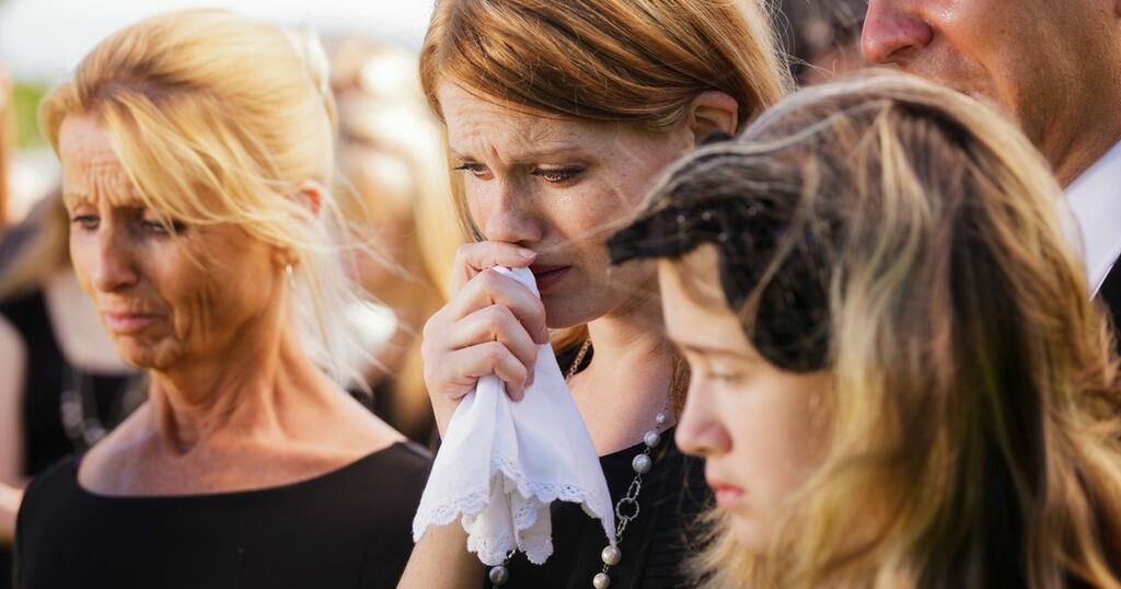 Woman kicks dad's secret girlfriend out of his funeral…