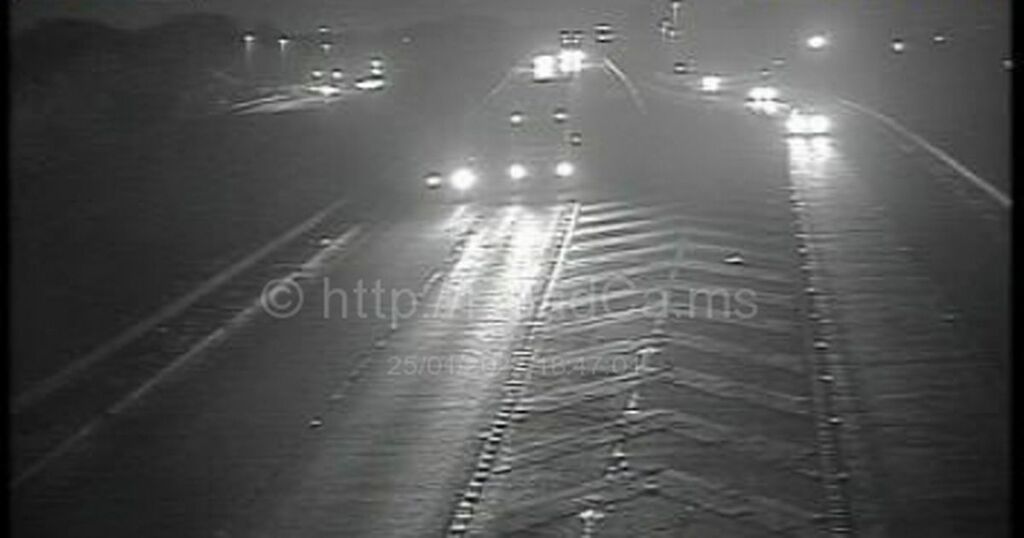 Car and van crash on M57 as traffic queues for miles