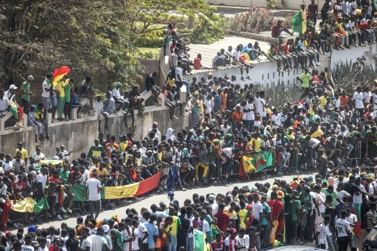 Senegalese pack streets to welcome victorious Cup of…