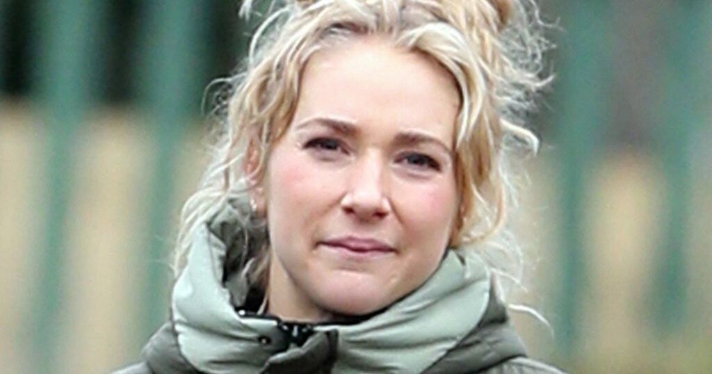 EastEnders star Maddie Hill spotted hobbling back to…