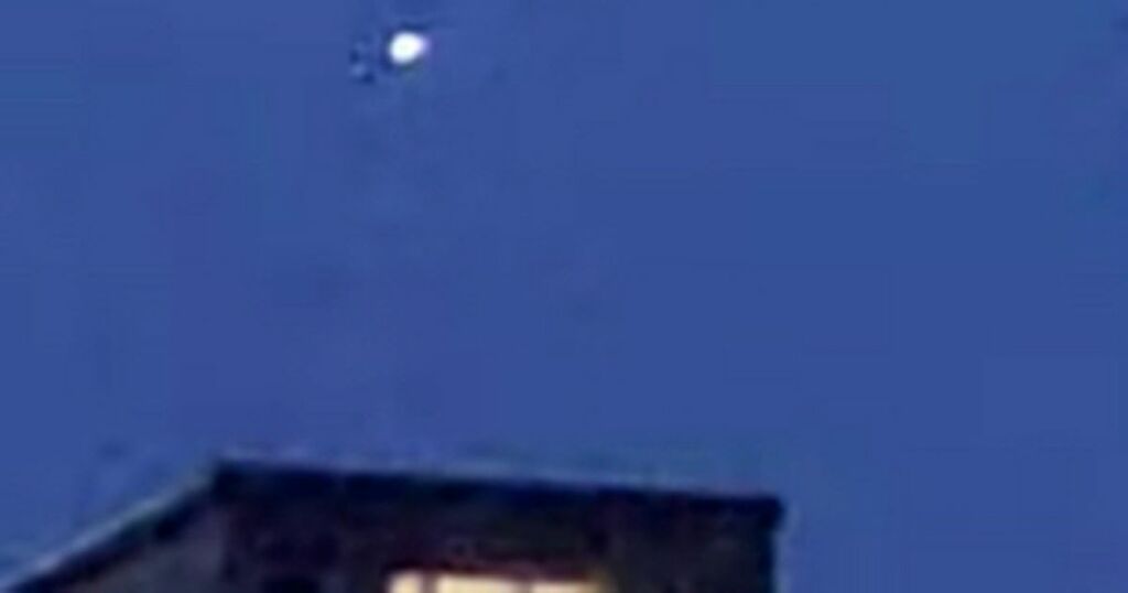 Edinburgh UFO caught on camera hovering above homes…
