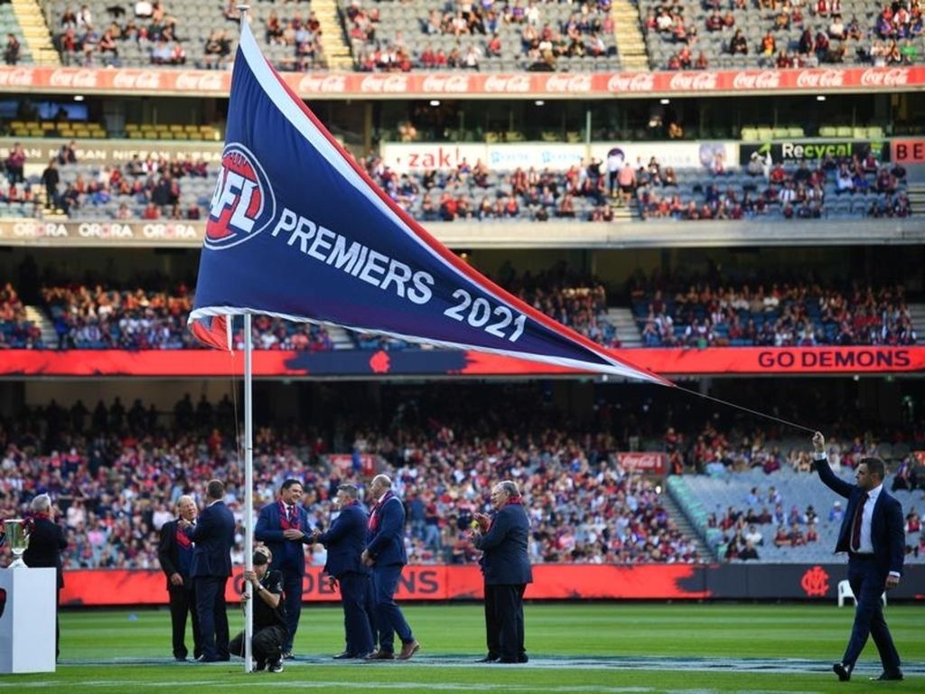 Melbourne Demons unfurl historic AFL flag
