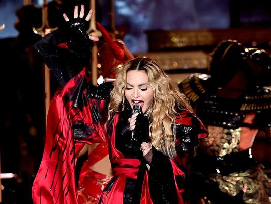 Madonna 'cries on stage' and dedicates song to Rocco…