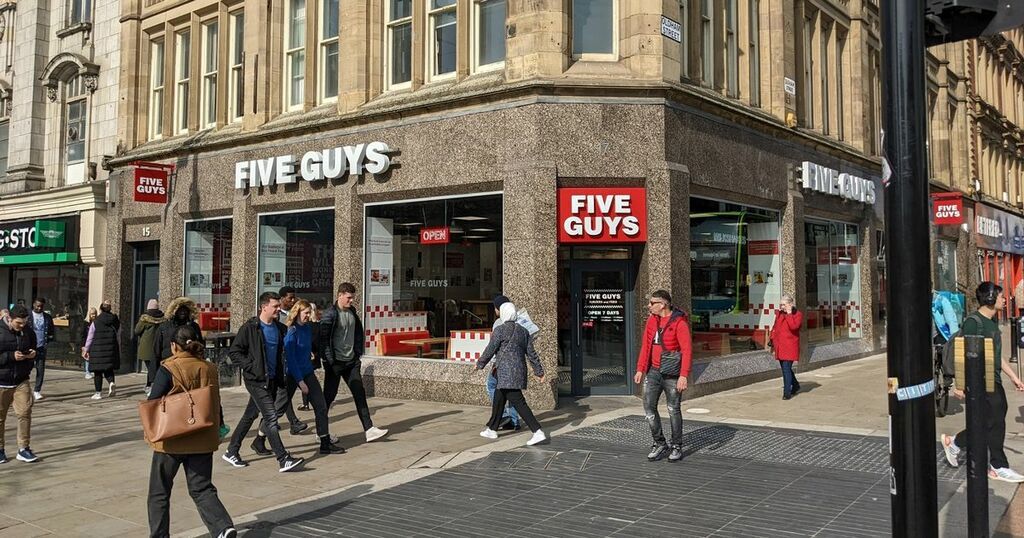 Five Guys opens in Piccadilly Gardens today but its…