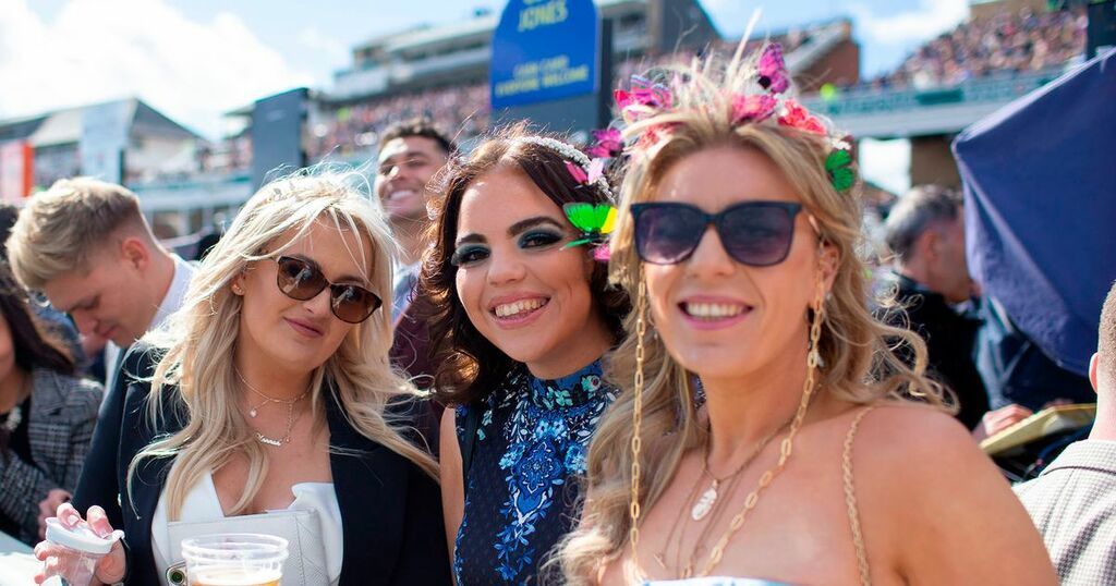 Grand National crowd pictures from a historic day at…