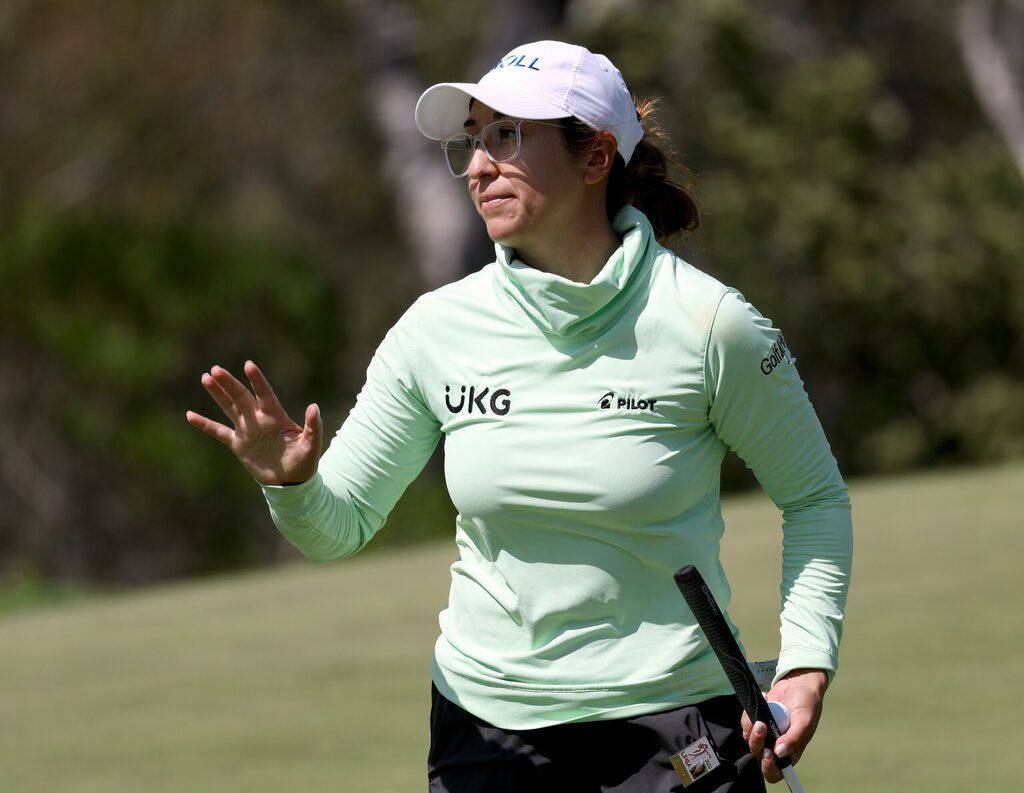 Marina Alex battles back from injury to claim second…
