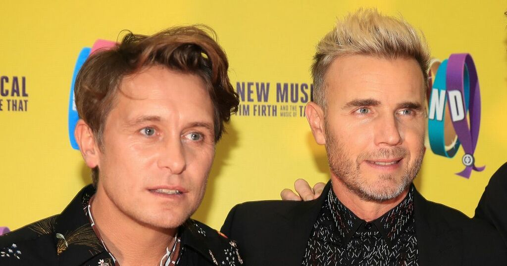 Mark Owen looks unrecognisable as Take That appear at…