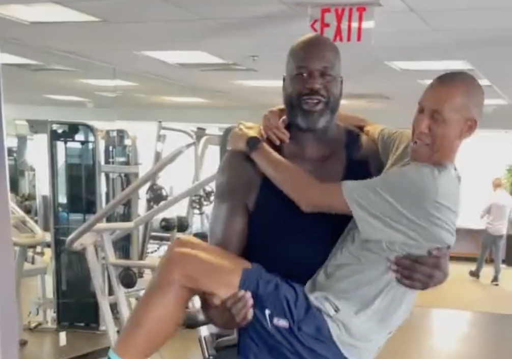 Shaq did bicep curls with Reggie Miller in his arms,…