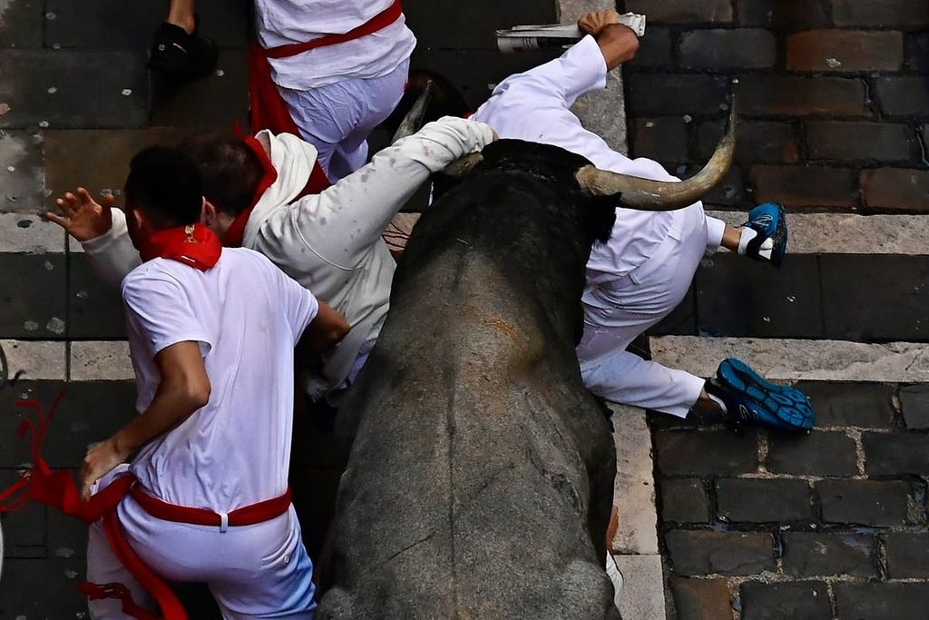 2 men gored while running with bulls at Pamplona…