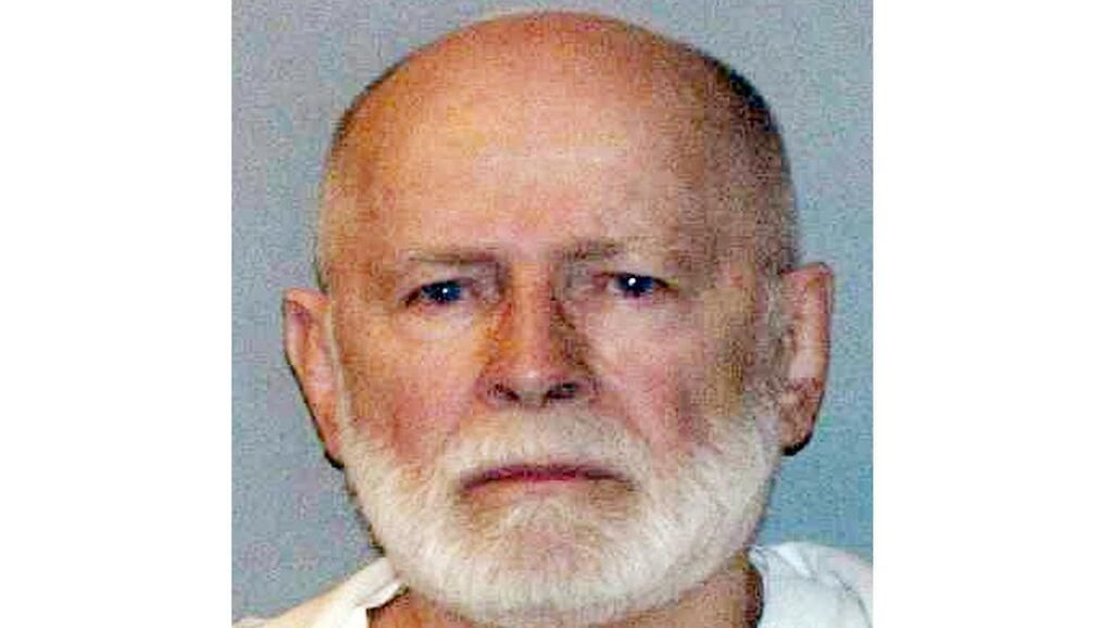 Three men charged over prison killing of Boston…
