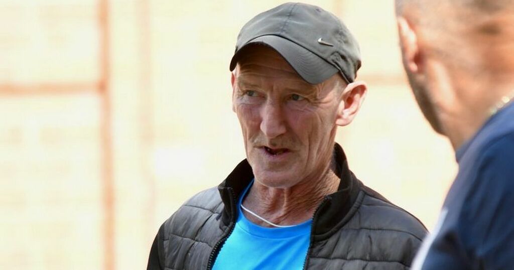 'I've got a body bag waiting for you, you grass'