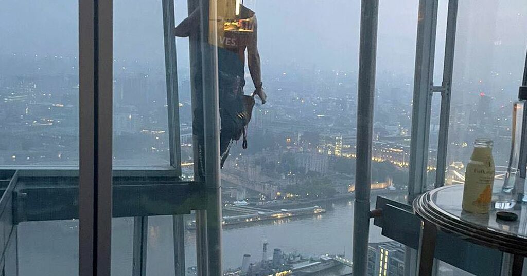Couple's shock at seeing barefoot man climb past their…