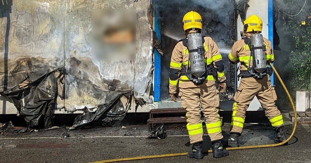 Shocking photo as prefabs go up in flames in south…