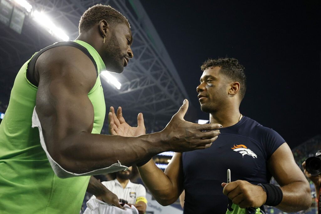 Russell Wilson and DK Metcalf shared a wholesome hug…