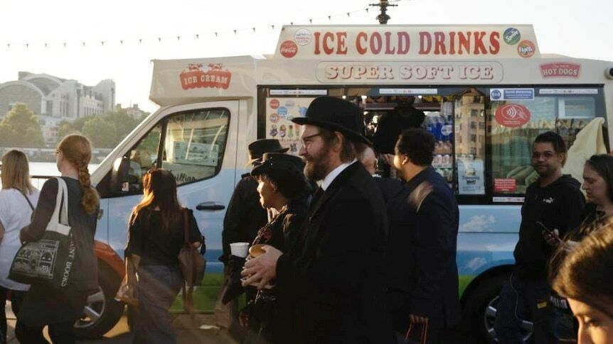 Queue snakes through London as people wait to see…