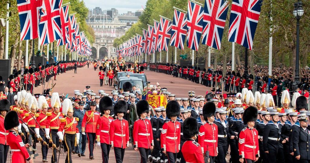 Queen's moving ceremonial procession through London as…