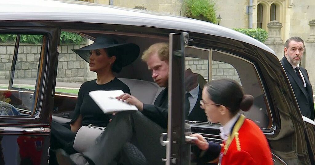 Prince Harry puffs cheeks out with deep sigh as he…