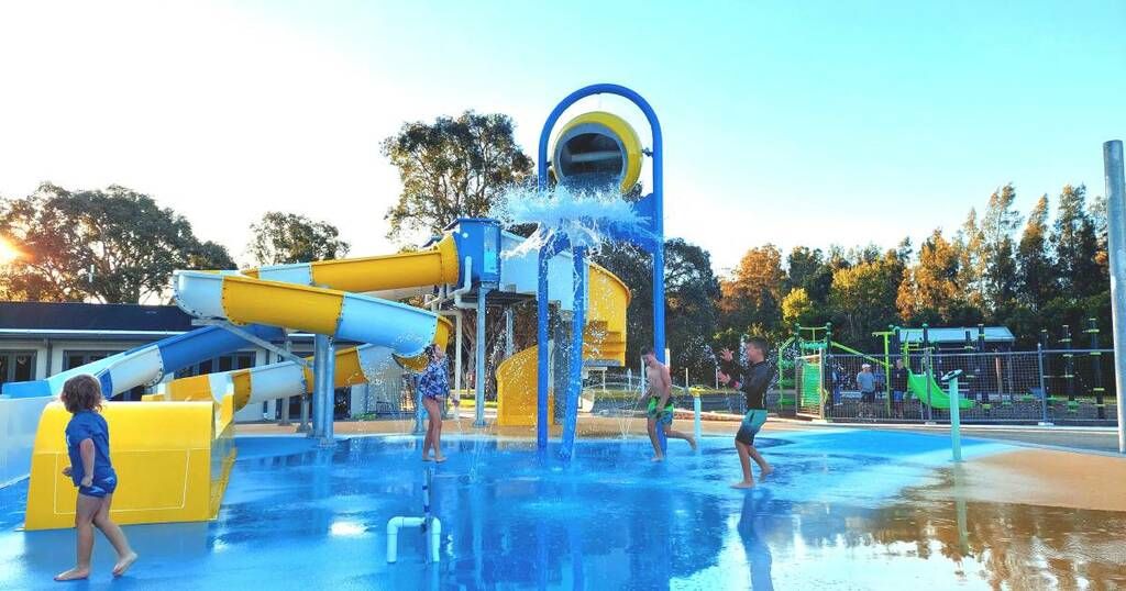 Slides, giant tipping bucket and water cannons in new…