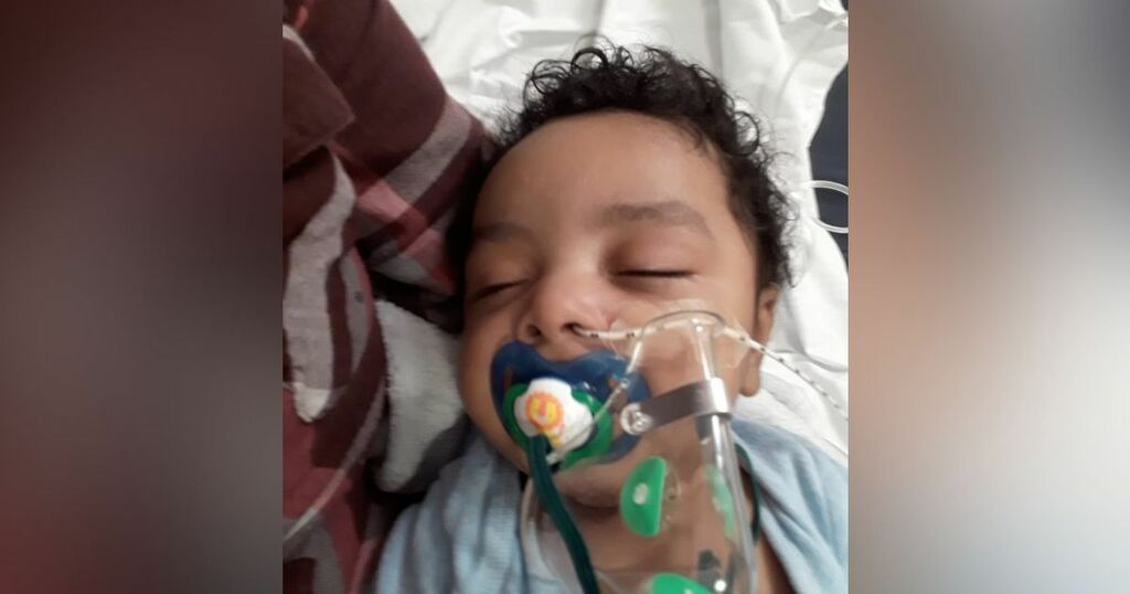 The heartbreaking moment baby struggles to breathe in…