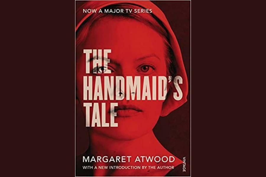 The Handmaid’s Tale: Dystopian future in which women…