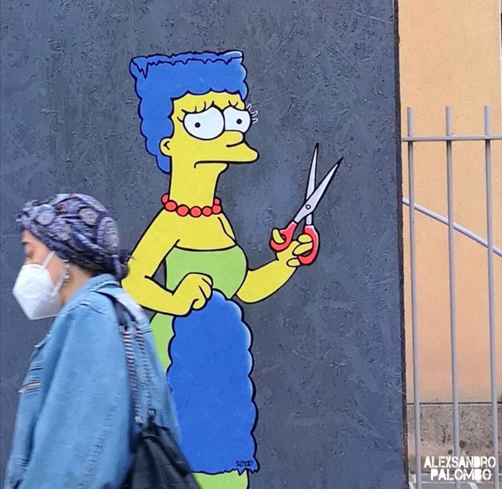 ‘Act of cowardice’: Mural of Marge Simpson chopping…