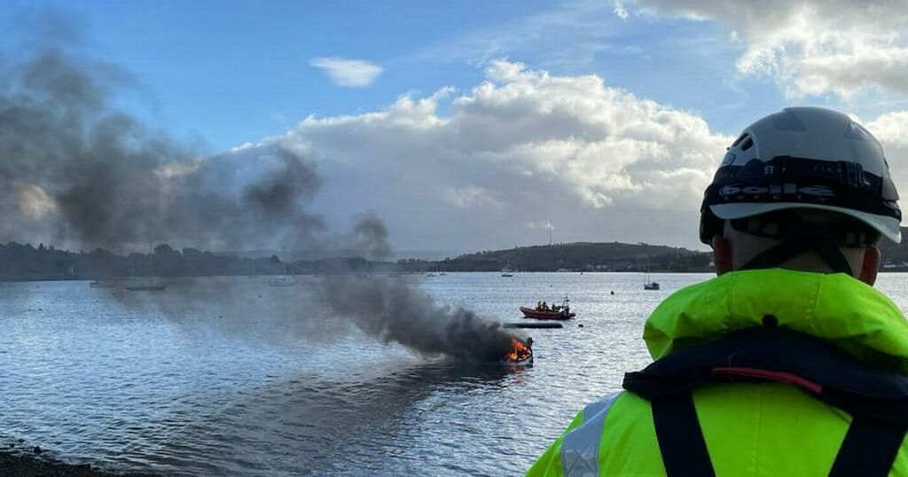 Crew member rescued from burning boat as coastguard…