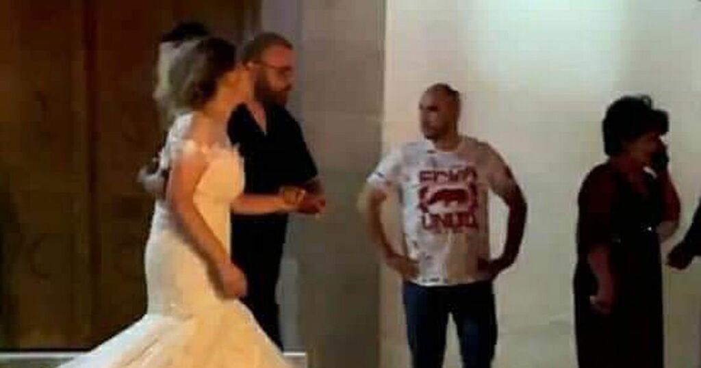 Bride in blood-soaked wedding dress hysterical as…