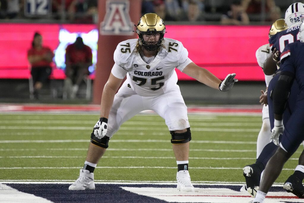 Colorado offensive lineman Tommy Brown signs iconic…
