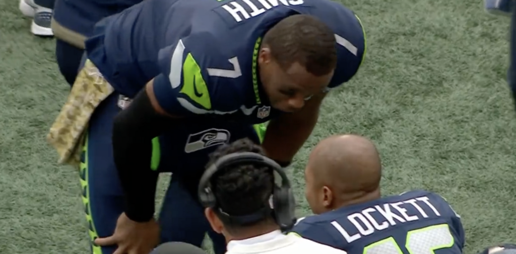 Geno Smith was seen encouraging Tyler Lockett after a…