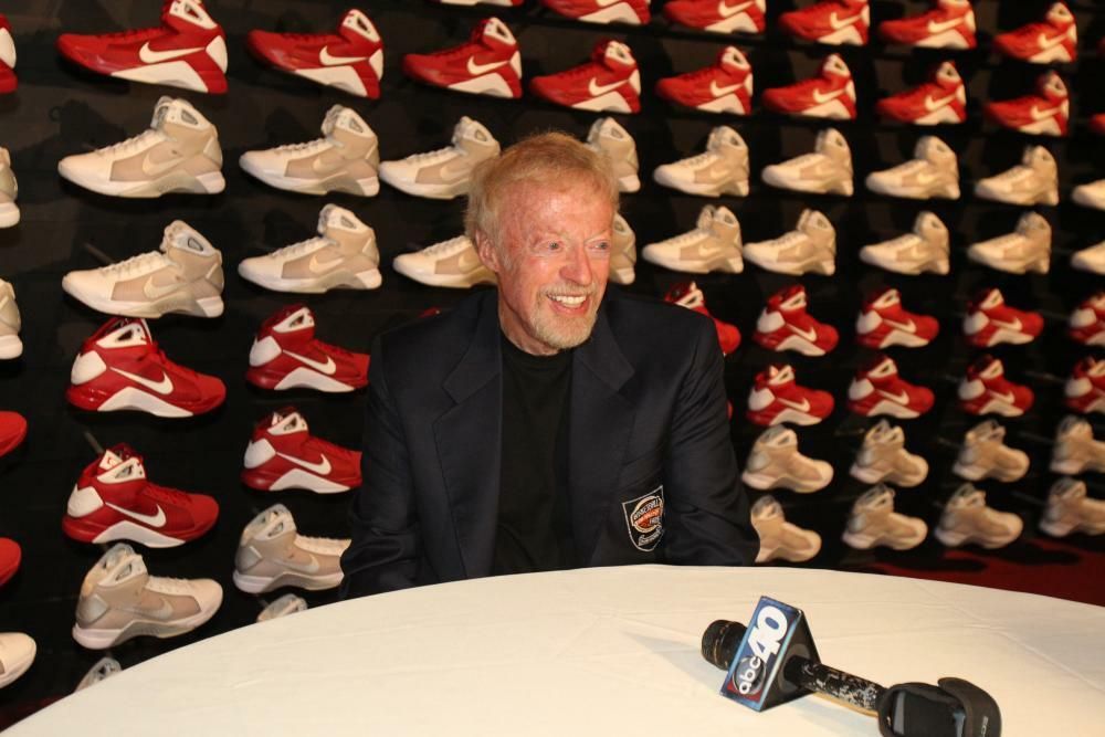 Why is Nike founder Phil Knight so desperate to…