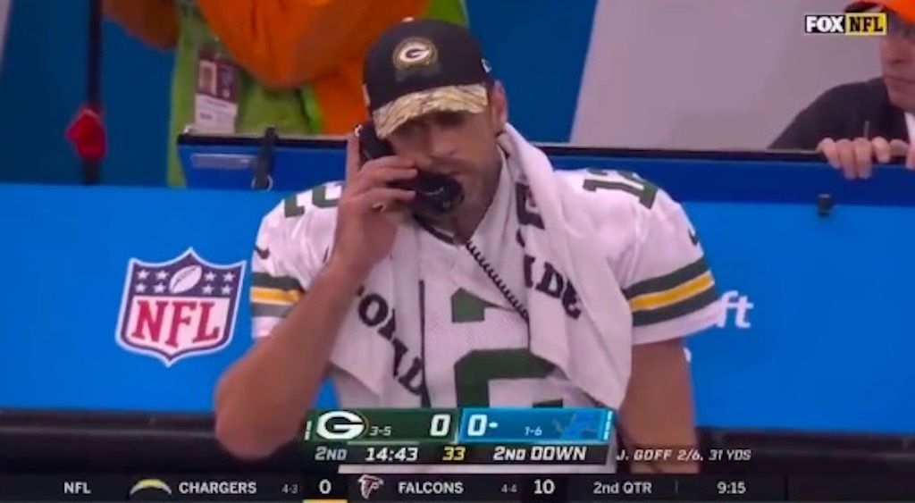 Aaron Rodgers getting mad while talking on a sideline…