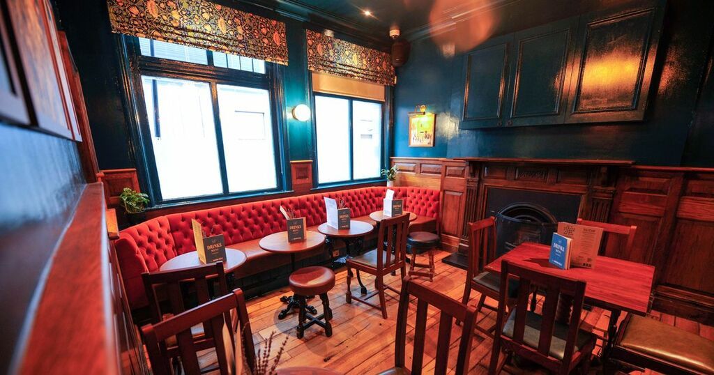 Historic Manchester pub ‘back in lights’ as it reopens…