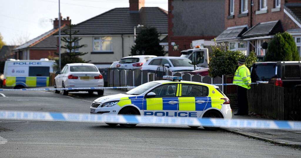 Two police cordons in place as armed officers are…